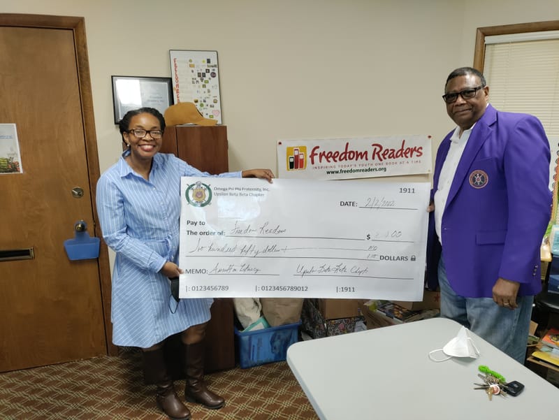 Check Presentation to Director of the Freedom Reader Program - Omega ...