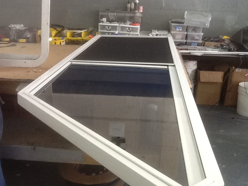 Flangeless sliders - Advanced Marine Windows and Doors Mfg Inc.