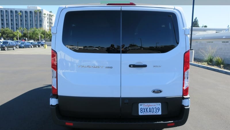 Ford Transit Low Top Passenger Van w/ Factory Wall - Stelletek