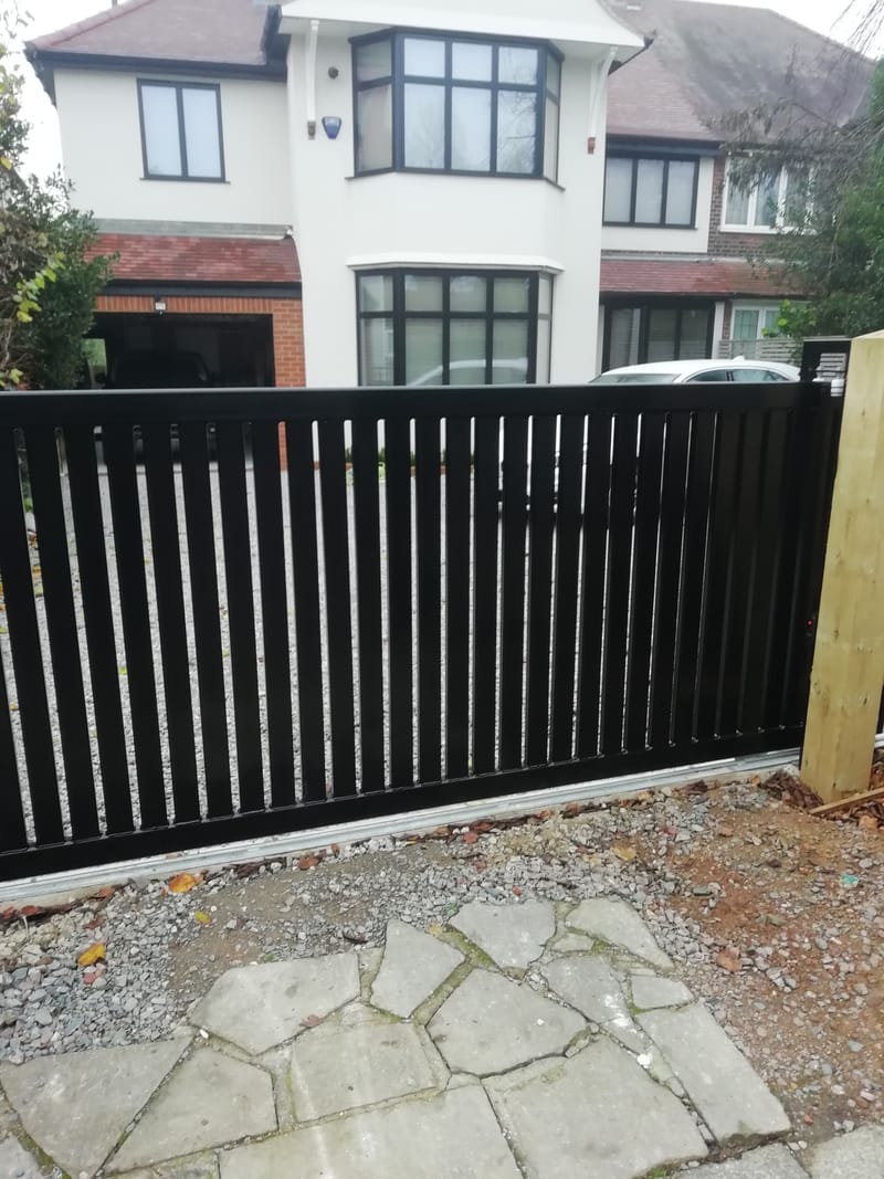 Automated Modern Style Sliding Drive Gate - Alpha Ironwork Ltd
